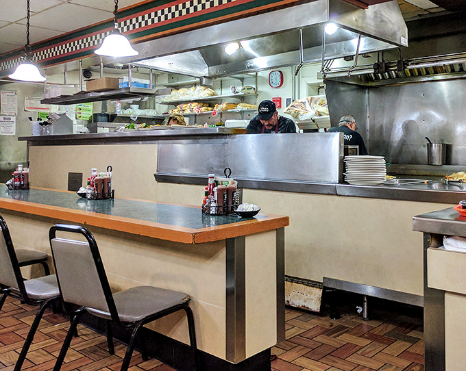 Counter seating offers front-row tickets to the culinary show, where solo diners can witness the beautiful chaos of a busy diner kitchen.