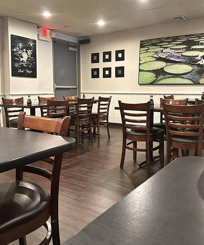 Simple wooden tables and chairs create an unpretentious backdrop where the food remains the undisputed star of the show.
