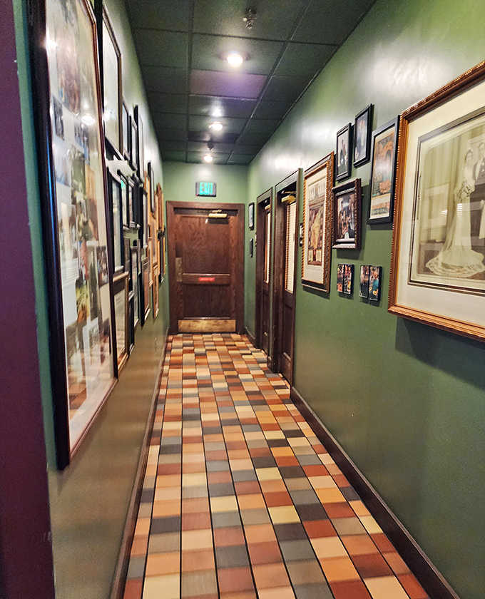 The hallway gallery showcases decades of history, each frame telling stories of community connections and memorable meals shared under this roof.