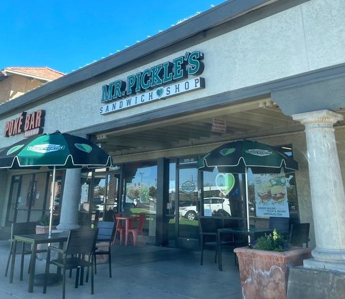 The outdoor patio offers a sun-dappled sanctuary for enjoying your sandwich creation while watching the world go by.