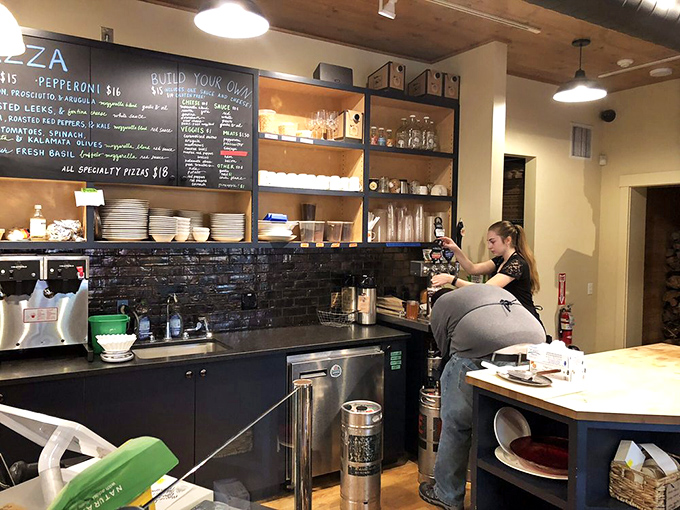 Prep Station: Where culinary magic happens – the open kitchen design lets you witness the careful craftsmanship behind each delicious creation.