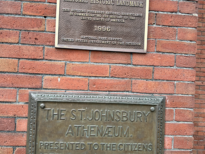 The brass plaques on the brick wall tell you this place is officially important, in case the stunning architecture didn't already give that away.