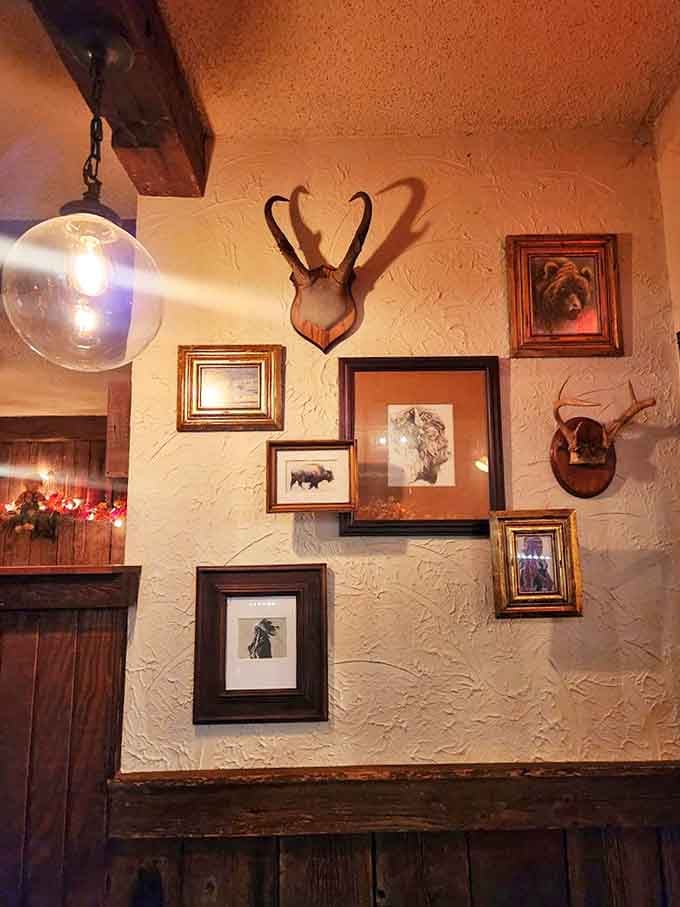 The wall décor blends hunting trophies with carefully selected artwork, creating an atmosphere that's authentically Wisconsin without trying too hard.