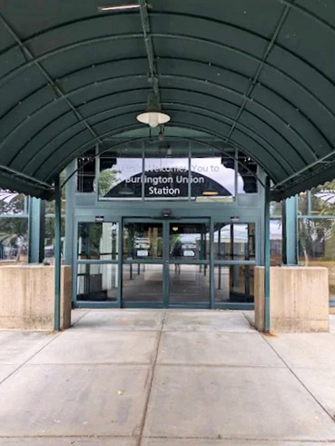 The welcoming entrance to Burlington Union Station invites travelers in with its covered walkway and promise of adventures beginning or ending.