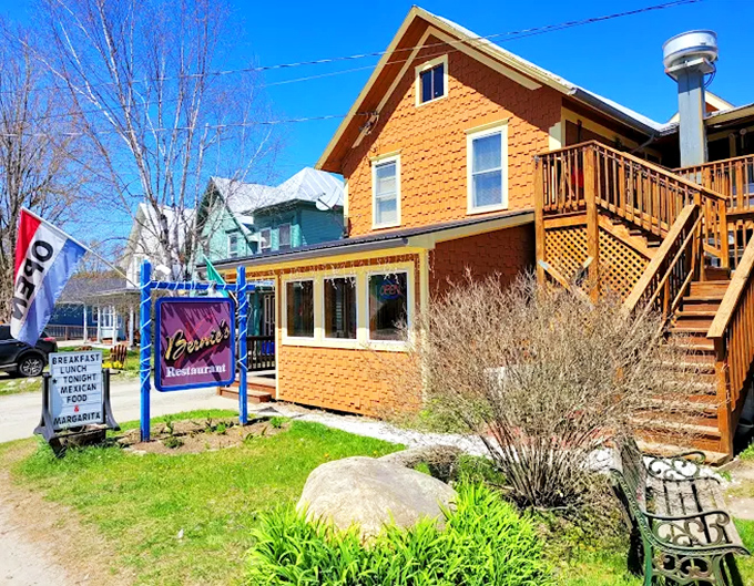 Spring sunshine highlights Bernie's welcoming porch and iconic blue sign &ndash; the kind of place that makes you slow down just driving past.