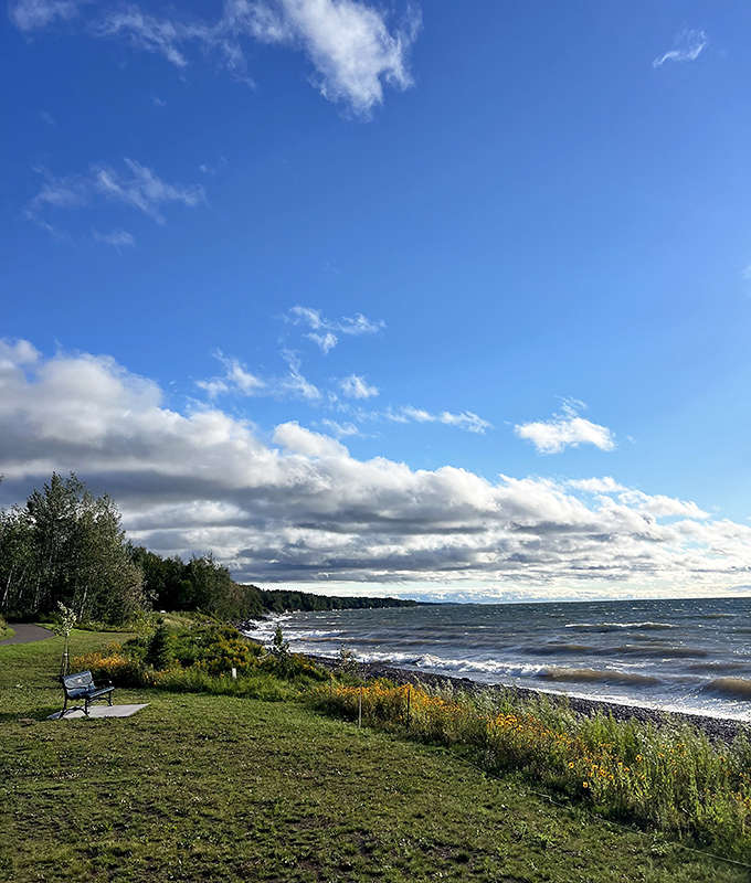 Under Minnesota's famously big sky, Lake Superior stretches like a freshwater ocean, its shoreline a geological museum open to all.