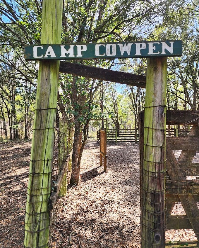 Camp Cowpen's entrance beckons with rustic simplicity &ndash; a portal to Florida's ranching heritage amid natural splendor.