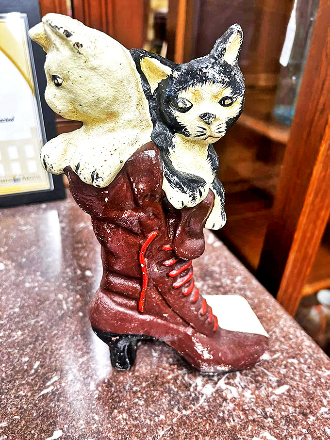 This cat-in-boot doorstop proves our ancestors had a sense of humor too. Practical, whimsical, and slightly weird &ndash; the antique trifecta!