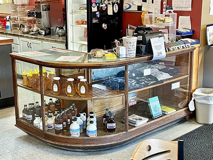 The counter area showcases local honey and maple syrup &ndash; proof that this diner doesn't just serve the community, it celebrates it.