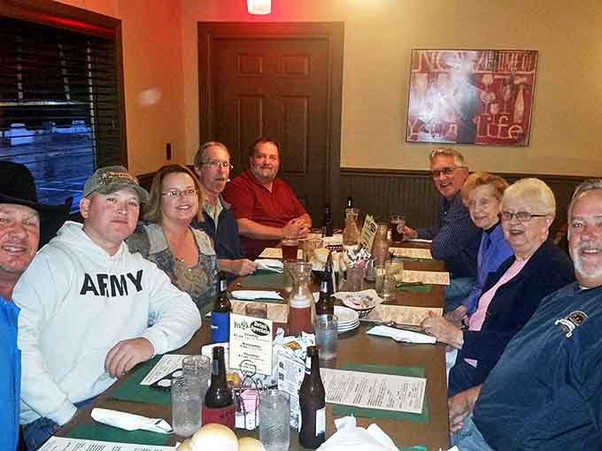 Happy diners sharing stories and sides &ndash; where "pass the butter" is the beginning of beautiful friendships.