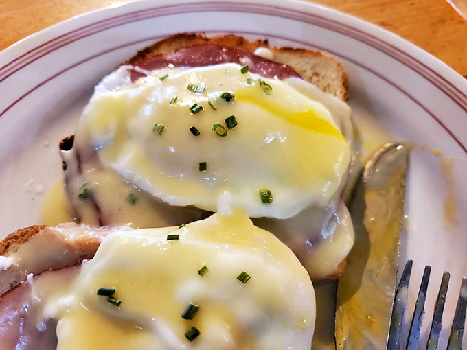 Eggs Benedict that could make a brunch enthusiast weep &ndash; perfectly poached eggs draped in hollandaise like they're wearing delicious yellow capes.