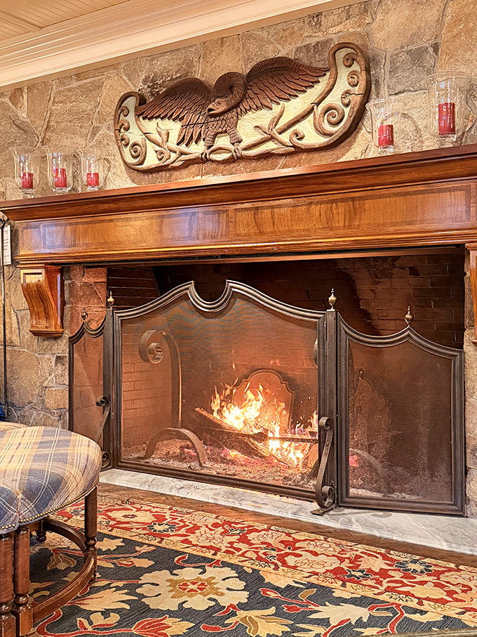 This isn't just a fireplace &ndash; it's a masterpiece of stone and craftsmanship where flames dance beneath an eagle that's witnessed countless fireside confessions.