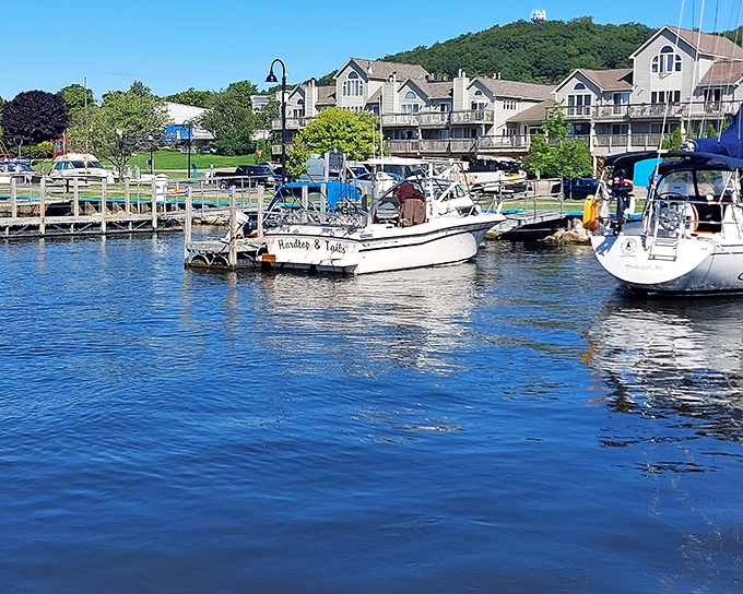 The marina showcases Frankfort's boating culture, where vessels from humble fishing boats to luxury yachts find harbor.
