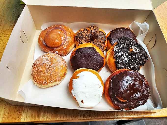 These aren't your sad gas station donuts, they're pillowy clouds of fried dough happiness in every flavor you could want.