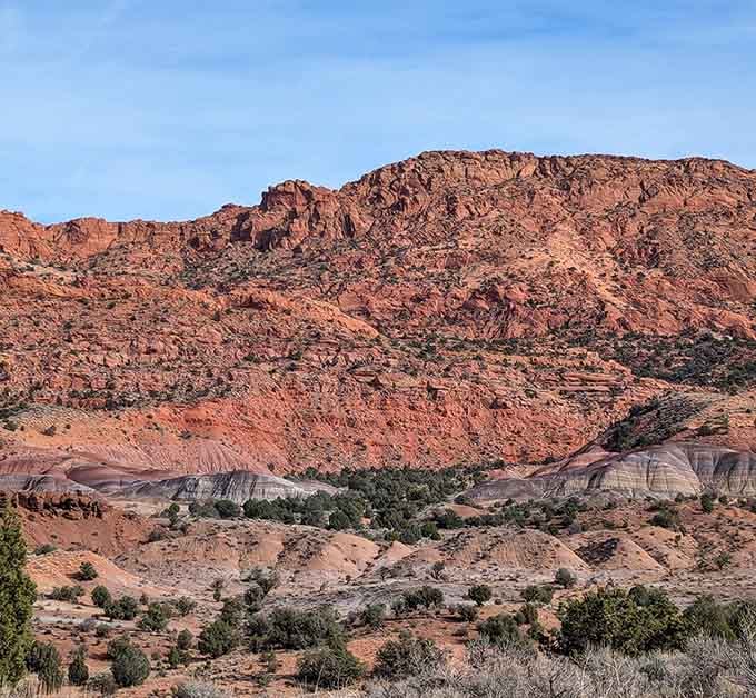 Layered cliffs and desert vegetation paint a landscape that's remained essentially unchanged for centuries of human history.