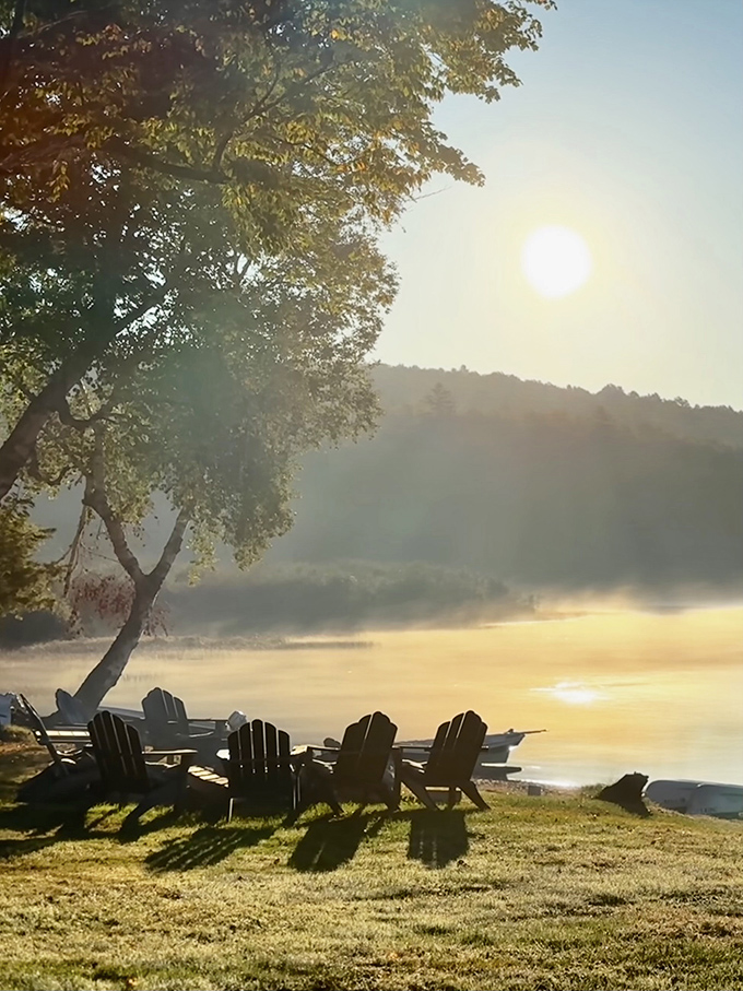 Golden hour perfection: Morning mist rises from Nahmakanta like nature's own steam bath, gilded by sunrise.