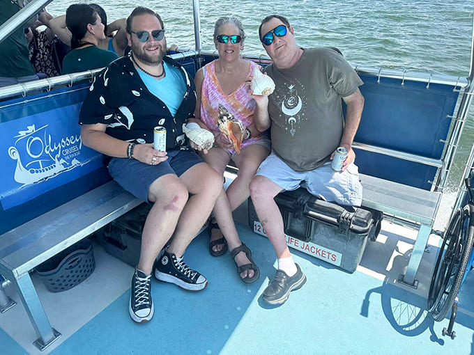 Success! Fellow adventurers display their impressive finds, shells so large they'll make your friends back home question your photography skills.