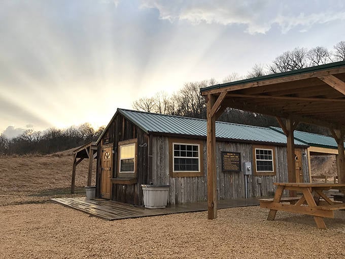 As day fades to dusk, Kerfoot's rustic headquarters glows with warmth, welcoming adventurers back to solid ground.