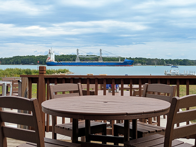 Outdoor deck seating where your dining companions include passing freighters – nature's dinner theater that no city restaurant could ever replicate.