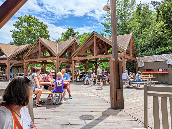 The outdoor seating area buzzes with activity &ndash; a perfect spot to relax after hiking, where nature provides the best ambiance money can't buy.