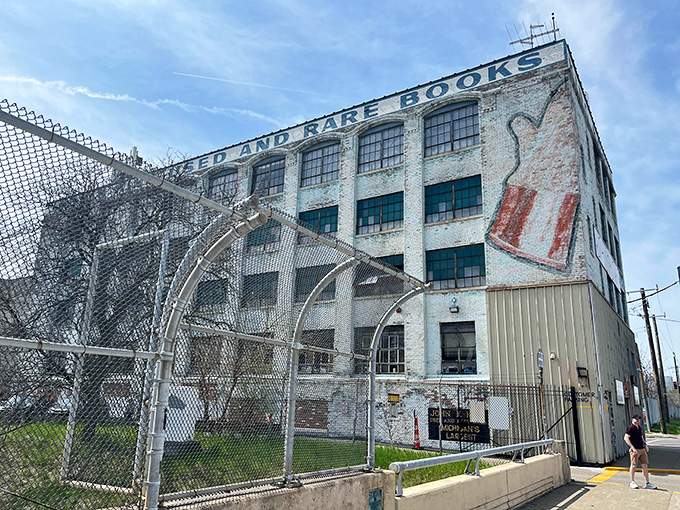 The weathered exterior stands proudly along the Detroit streetscape, announcing its literary mission to everyone passing by with vintage painted letters.