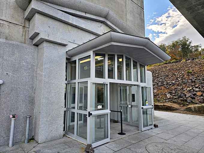 The entrance to your vertical journey, where elevators become time machines to the clouds above.