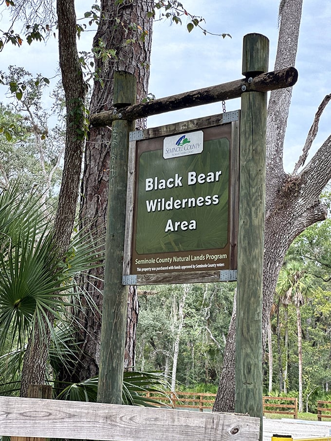 The official entrance sign stands sentinel, marking the boundary between everyday Florida and this remarkable wilderness sanctuary.