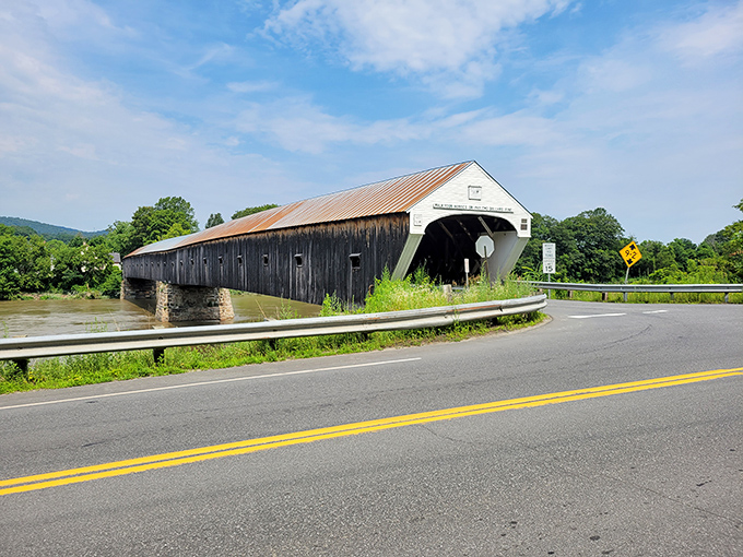 The bridge stands as a steadfast landmark along Route 12A, inviting travelers to slow down and experience a piece of living history.