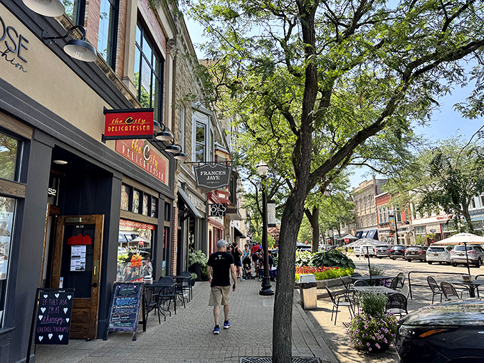 Outdoor dining spaces line the streets, creating a convivial atmosphere where food, friends, and fresh air combine perfectly.