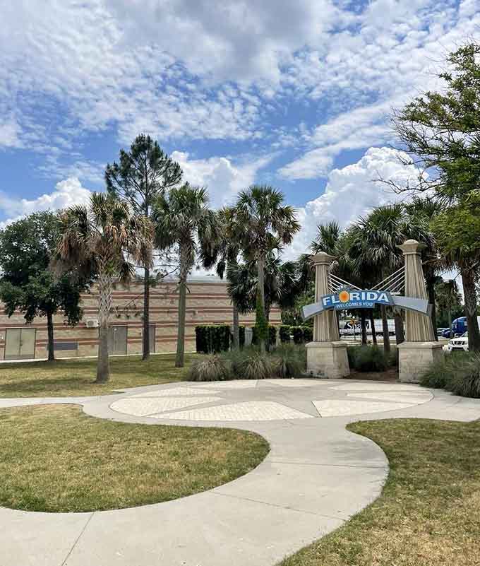Curved walkways invite exploration of the grounds, offering multiple angles for capturing your "we made it to Florida" moment.