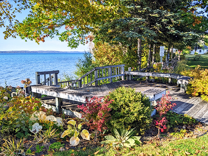 Sunset cocktails on a lakeside deck, where Michigan evenings transform from spectacular to magical as day surrenders to dusk.