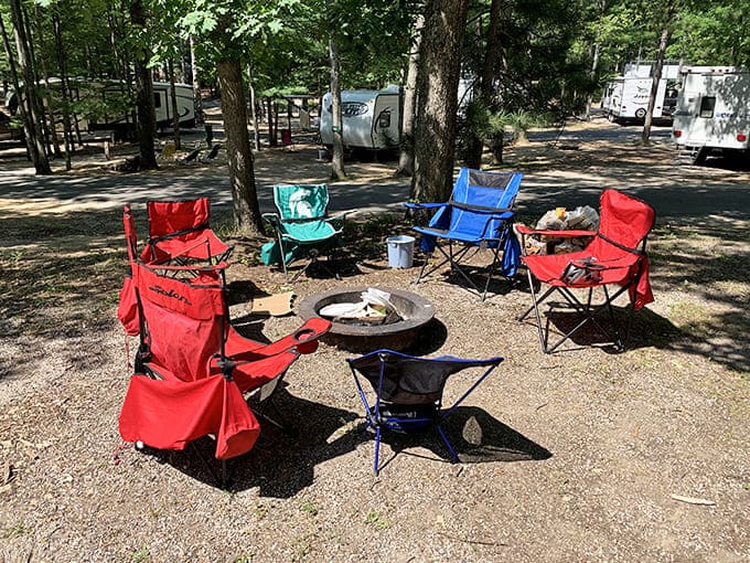 Campfire circles with colorful chairs create the perfect setup for making memories, burning marshmallows, and telling stories that get better with each retelling.