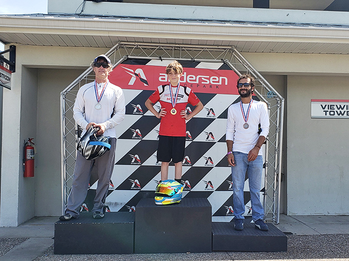 Victory stand: Where dreams are realized, bragging rights are earned, and everyone pretends they're at Monaco instead of Palmetto.