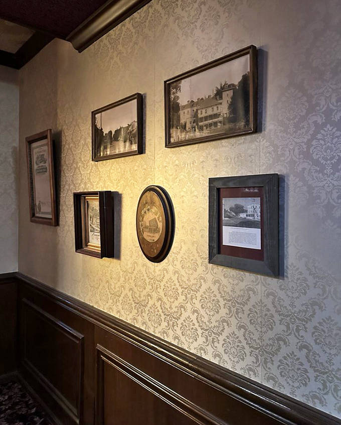 Framed memories line damask-patterned walls, creating a museum-like gallery where history is always on display.