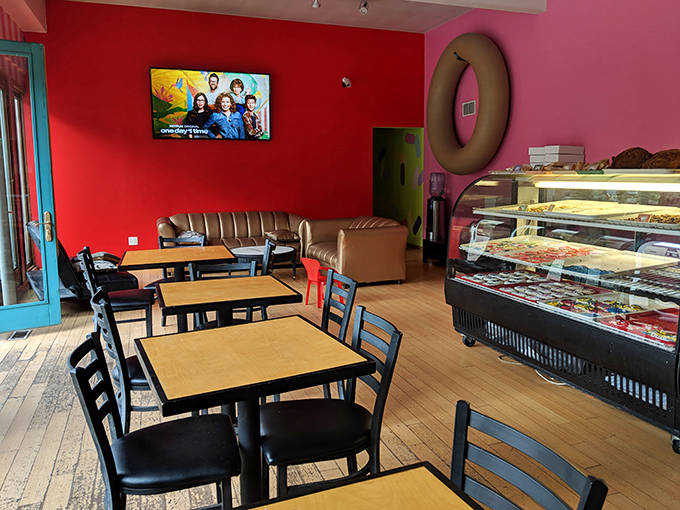 The casual seating area invites you to linger, making "just one donut" turn into "maybe I'll try that one too."