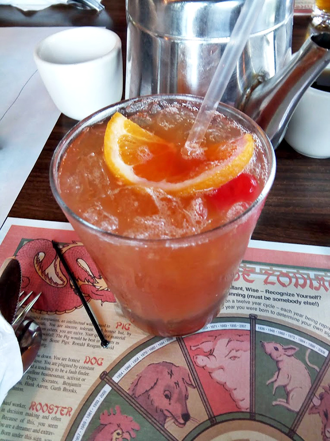 This isn't just a drink &ndash; it's a sunset in a glass, complete with fruit garnish island and the promise of relaxation with every sip.