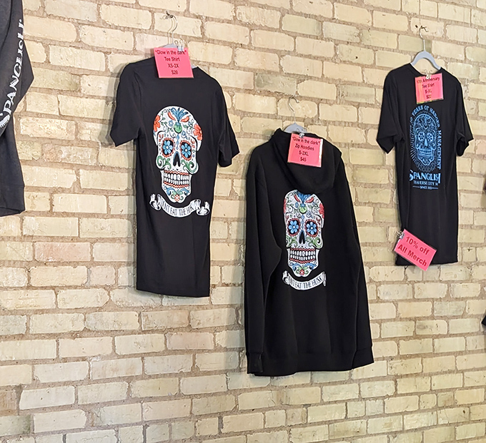 Sugar skull designs adorn the merchandise – a nod to the authentic cultural roots that inspire every dish.