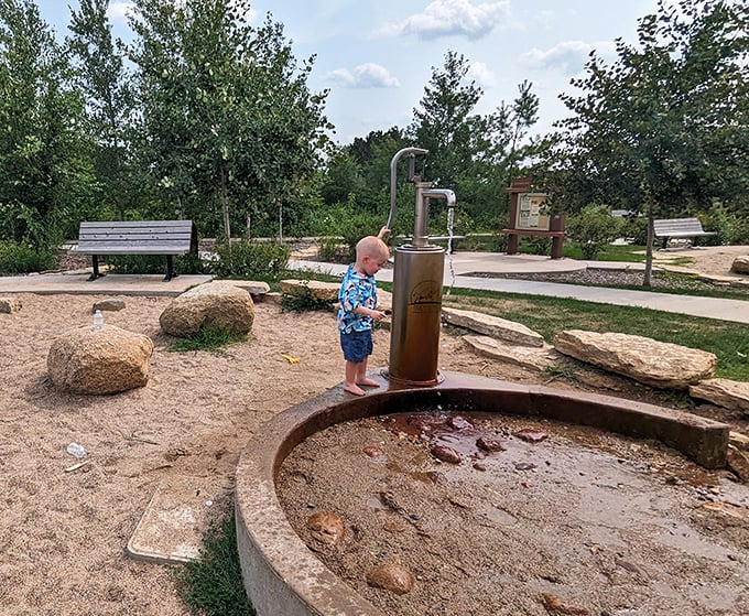 The hand pump transforms ordinary kids into water engineers, creating streams, puddles, and inevitably, very wet shoes.