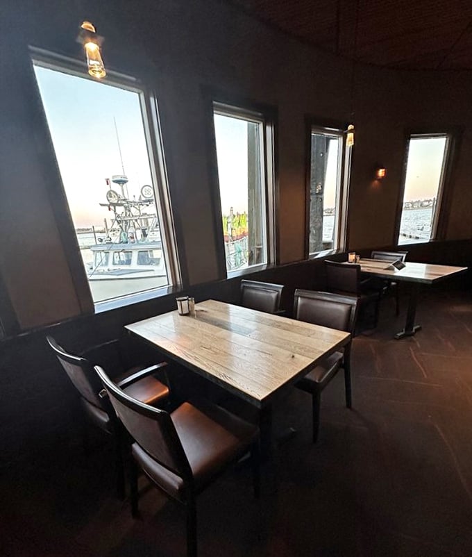 Intimate dining nooks offer harbor views through large windows &ndash; romance and seafood, perfectly paired.