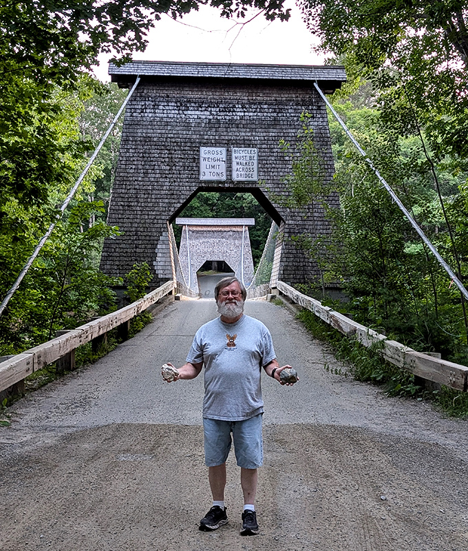 Visitors often pause mid-bridge, contemplating the remarkable feat of engineering that continues to serve its purpose after nearly 200 years.