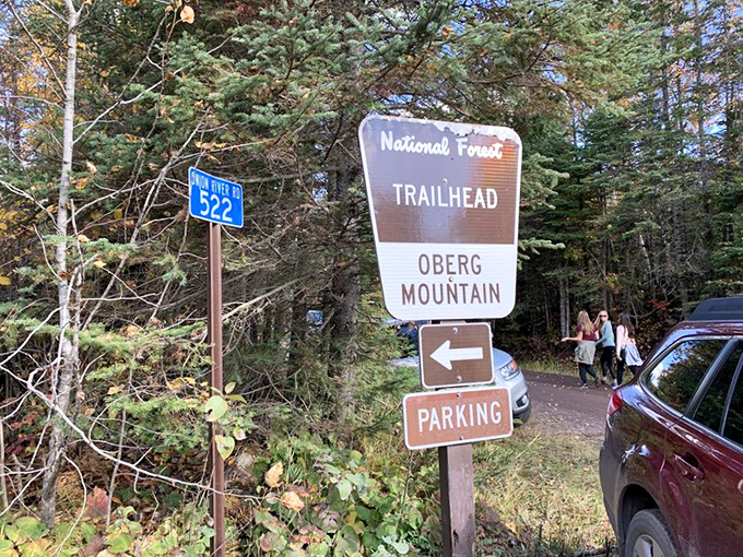 Follow the signs to wonder: Oberg Mountain's trailhead marks the threshold between ordinary life and natural magnificence.