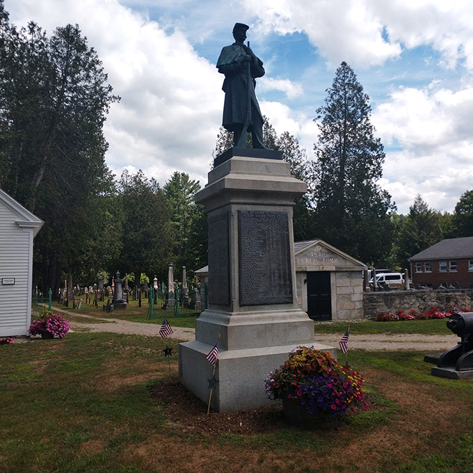 Another angle of the memorial statue, where history stands tall against a backdrop of small-town reverence and remembrance.