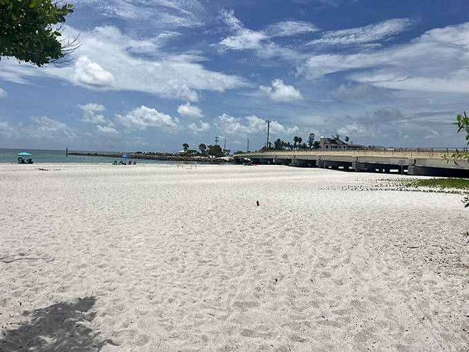White sand beach: Powder-soft sand stretches as far as the eye can see, the perfect canvas for footprints, sandcastles, and afternoon naps.