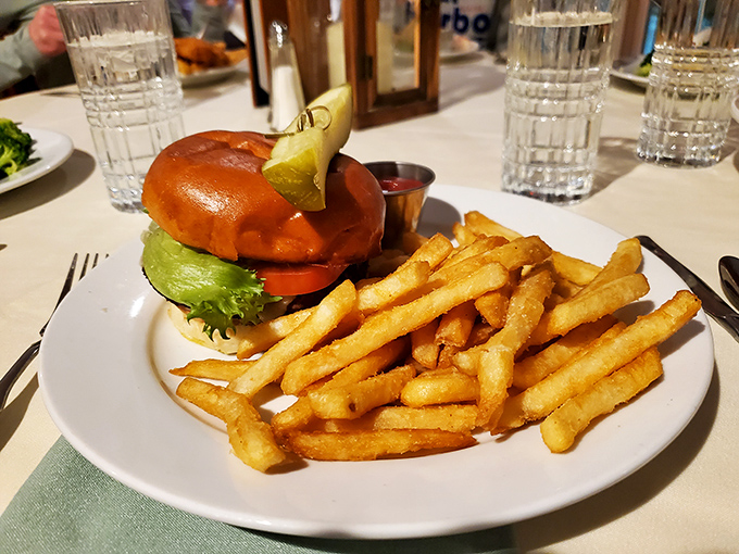 Classic comfort food: This juicy burger with golden fries isn't trying to reinvent cuisine &ndash; it's perfecting the classics you crave.