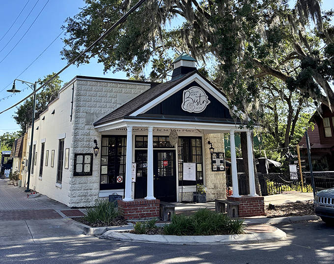 Mount Dora Bistro's classic black-and-white exterior hints at the timeless dining experience waiting inside this local favorite.