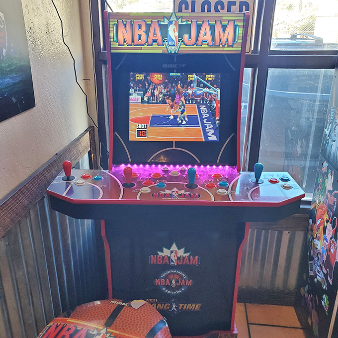 NBA Jam stands ready to entertain while you wait, its joysticks practically begging for "He's on fire!" moments.