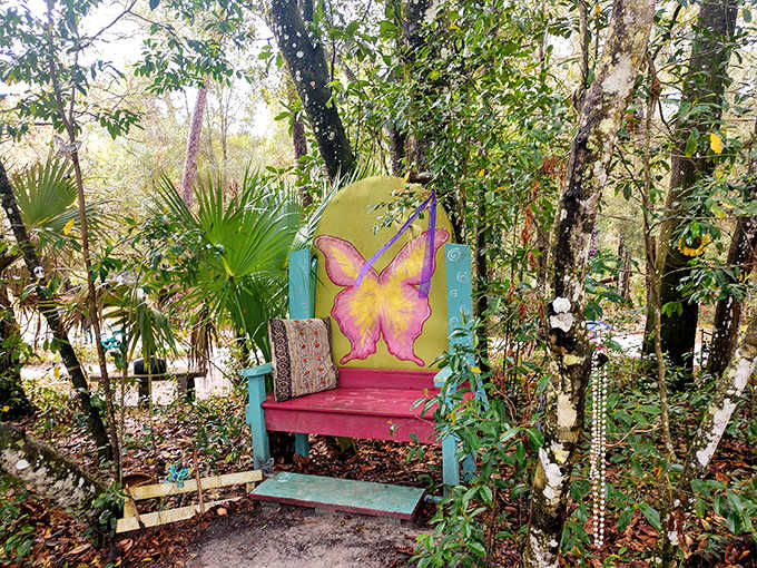 The butterfly bench provides a magical resting spot where visitors can pause to absorb the whimsy while planning their next fairy house contribution.