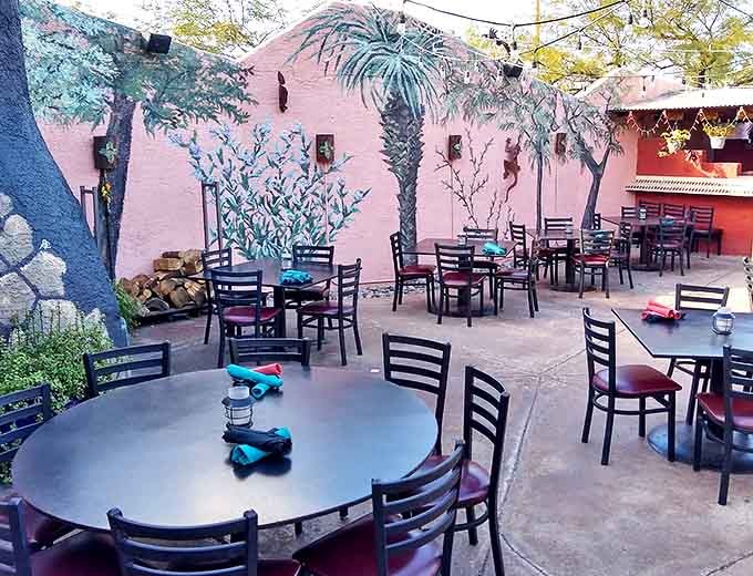 The outdoor patio offers multiple seating areas, each one perfect for pretending you're on vacation while actually being ten minutes from home.