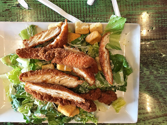 A chicken Caesar salad that proves healthy options can thrive even in the land of bowling alley indulgence.