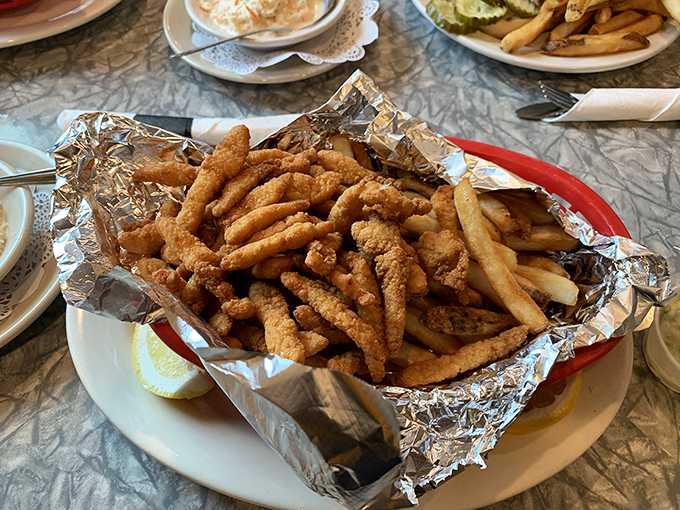 A foil-lined basket of golden-fried treasures from the sea, proving that inland Vermont knows its way around seafood surprisingly well.